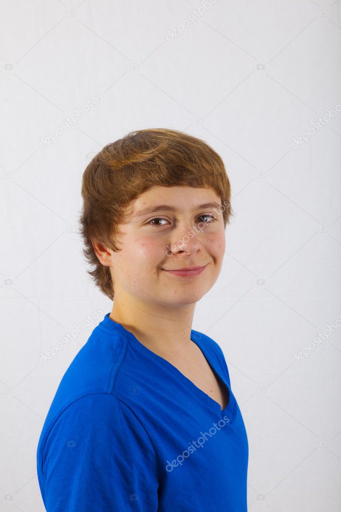 Smart happy young boy posing in studio — Stock Photo © Hackman #12808314