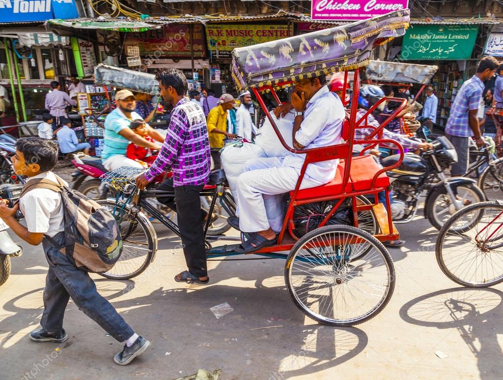 Indian men uses the rickshaw for transportation in old Delhi – Stock ...