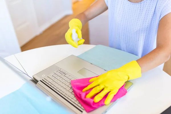 spraying down , wiping , and Cleaning laptop Surface with Protective ...