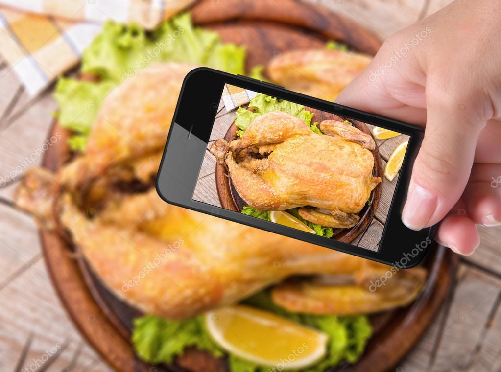 Hands taking photo chicken with smartphone — Stock Photo © RasulovS ...