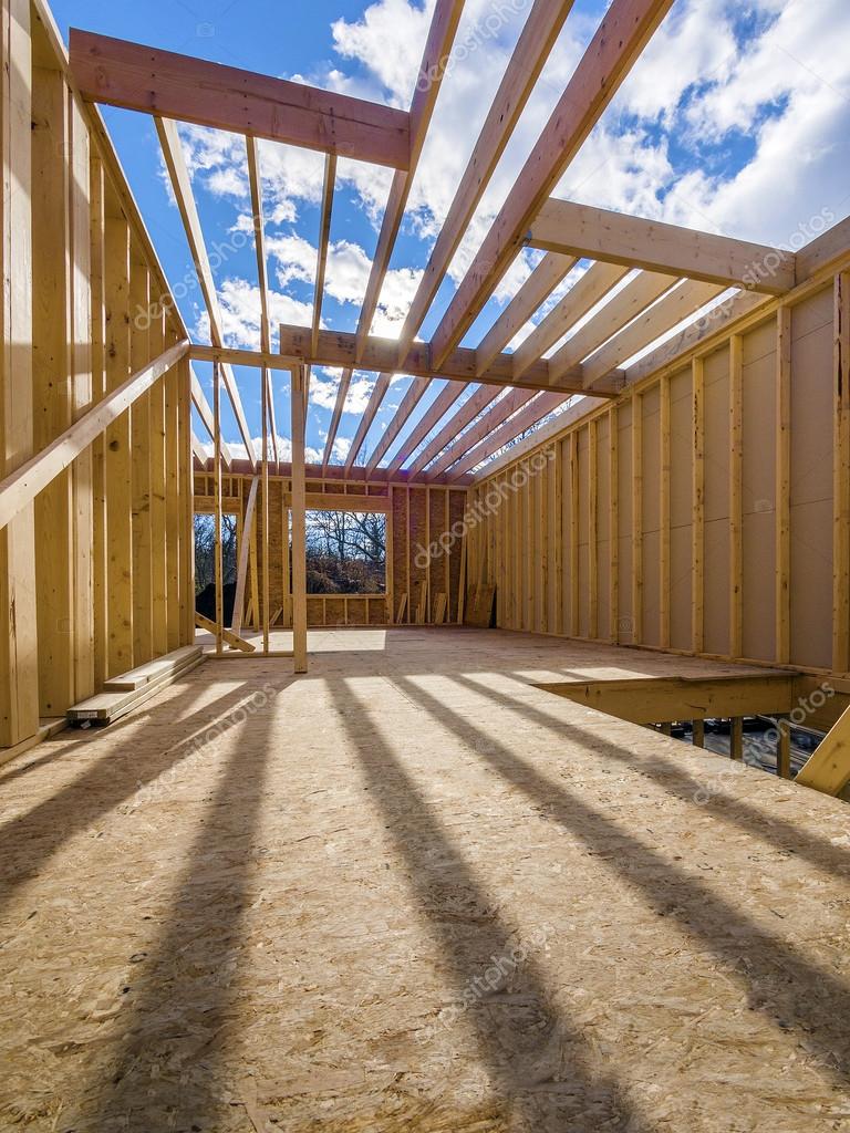 New framing construction of a house — Stock Photo © Sonar #38996047