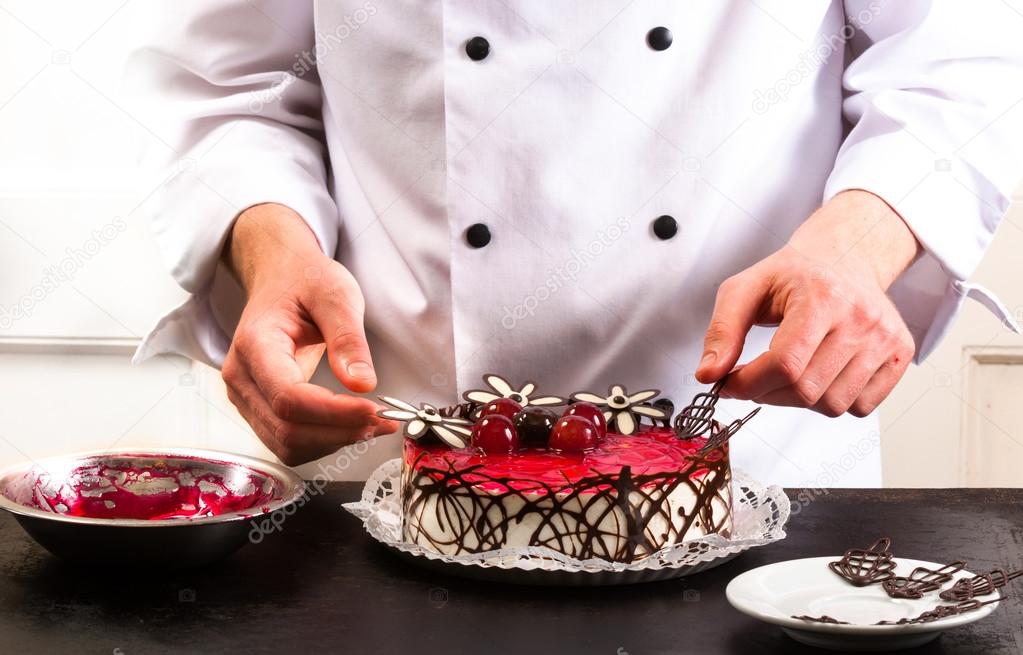 Confectioner and a cake Stock Photo by ©svedoliver 12747194