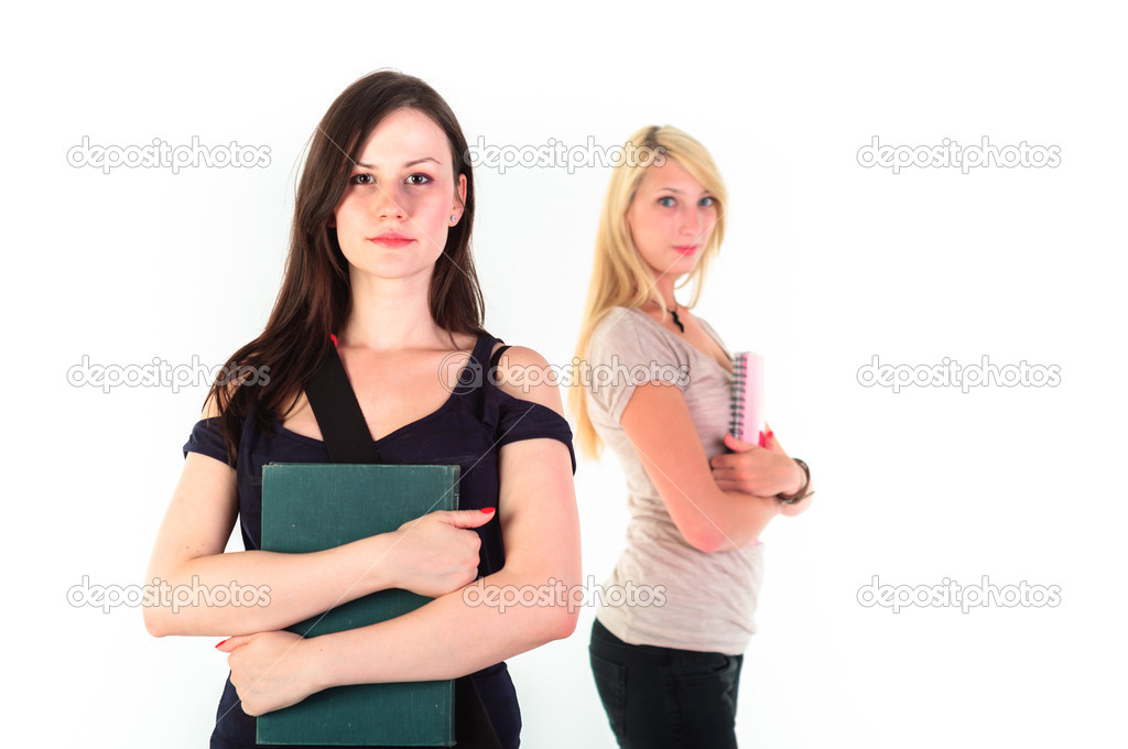 Two beautiful student girls getting ready for school Stock Photo by ...