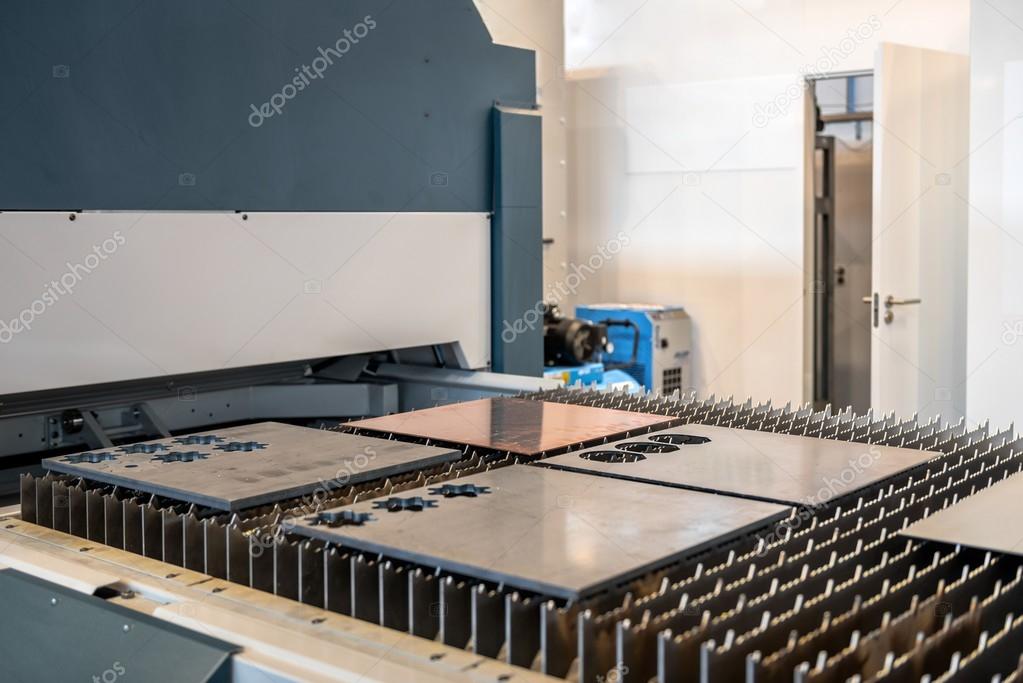 Machine cutting steel in a factory — Stock Photo © svedoliver #34839753