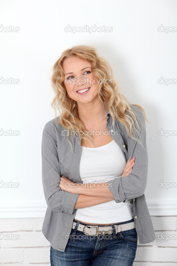Cheerful casual woman standing — Stock Photo © Goodluz #18194267 Cheerful casual woman standing — Stock Photo © Goodluz #18194267