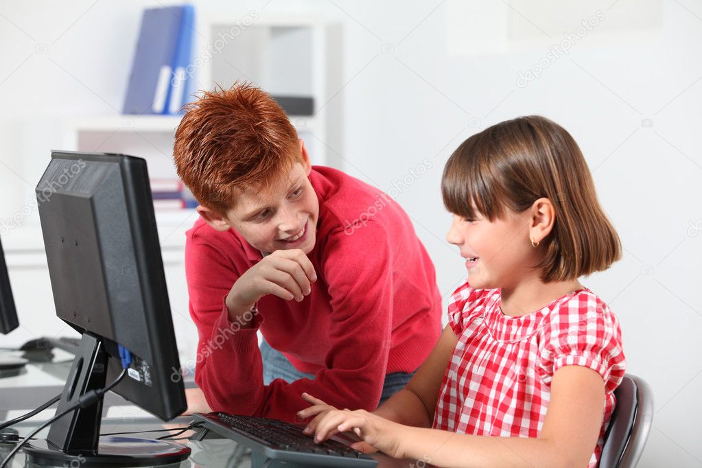 Children sitting in classroom in front of computer Stock Photo by ...