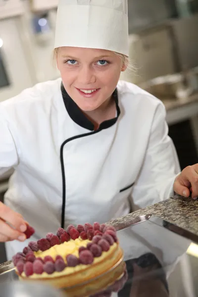 Pastry cook student making cake - Stock Image - Everypixel