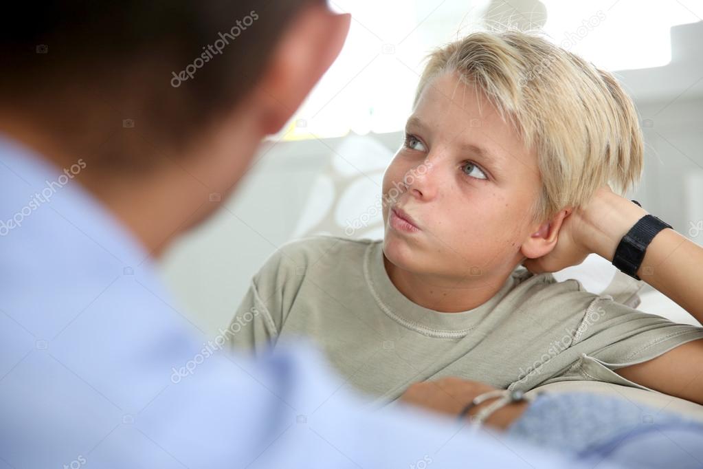 Daddy talking to his son — Stock Photo © Goodluz #38960481