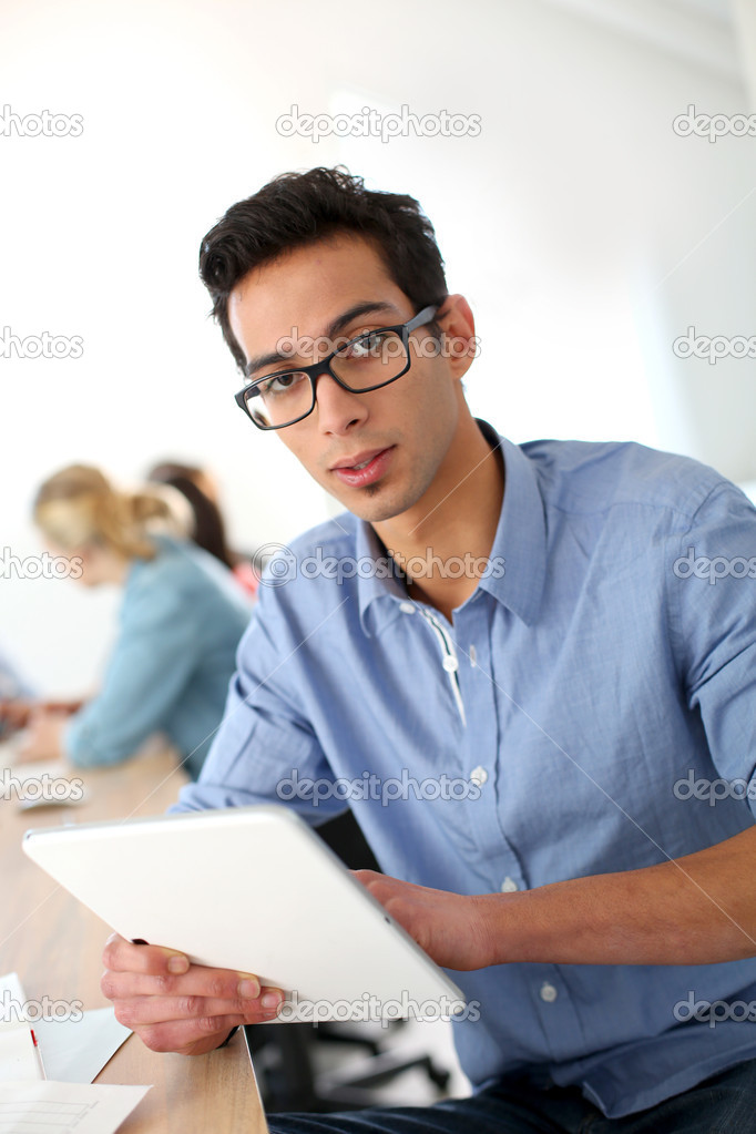 Student using tablet — Stock Photo © Goodluz #41328915