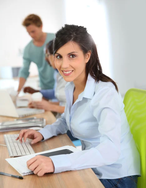 Woman attending business training Stock Photo by ©Goodluz 43754791