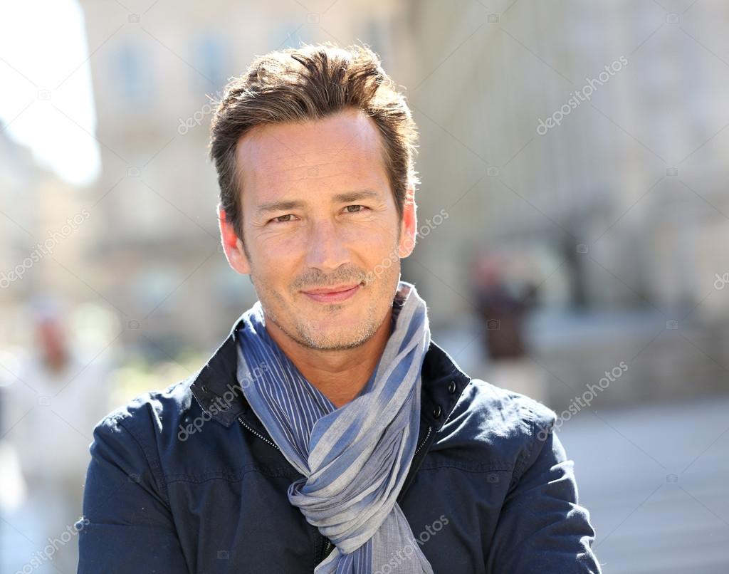Handsome man in town Stock Photo by ©Goodluz 47780225