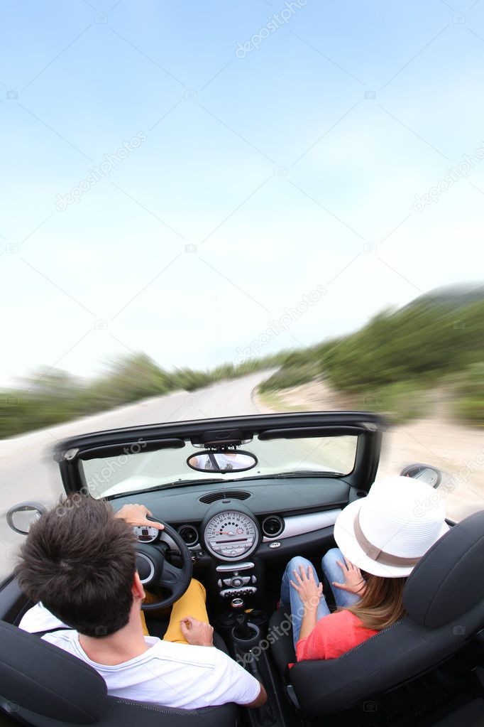Couple driving car — Stock Photo © Goodluz #47816363