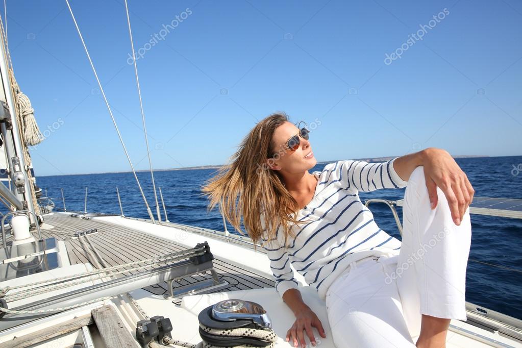 Woman sailing — Stock Photo © Goodluz #47818825