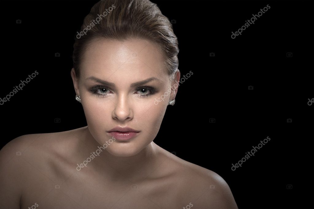 Portrait of a beautiful serious woman Stock Photo by ©MOELLERTHOMSEN ...