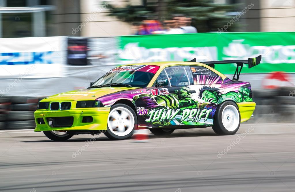 Car driver piloting his car at Romania's National Championship Drift ...
