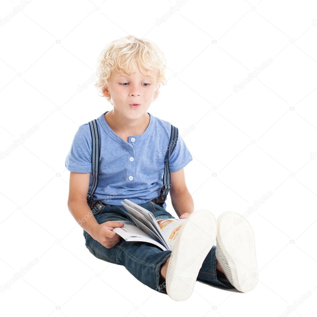 Cute boy with book Stock Photo by ©Smirno 34866535