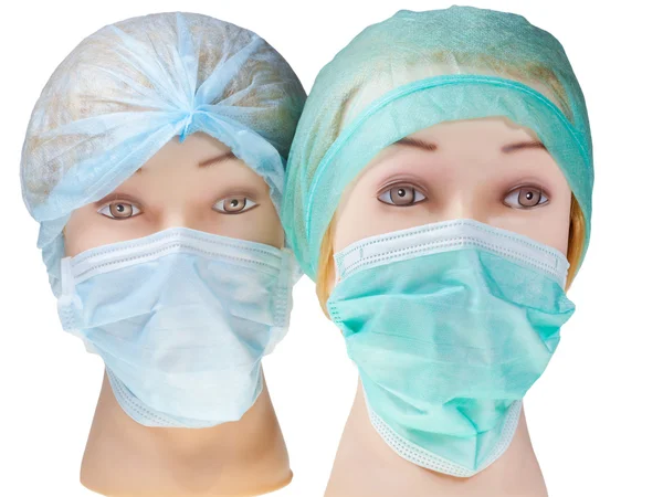Dummy doctor head wearing textile surgical cap and mask Stock Photo by ...