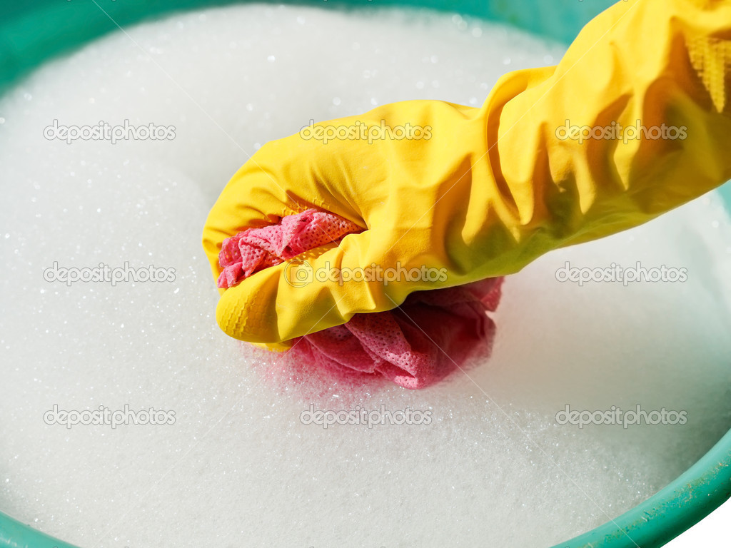 Hand in yellow rubber glove rinsing wet cloth Stock Photo by ©vvoennyy ...