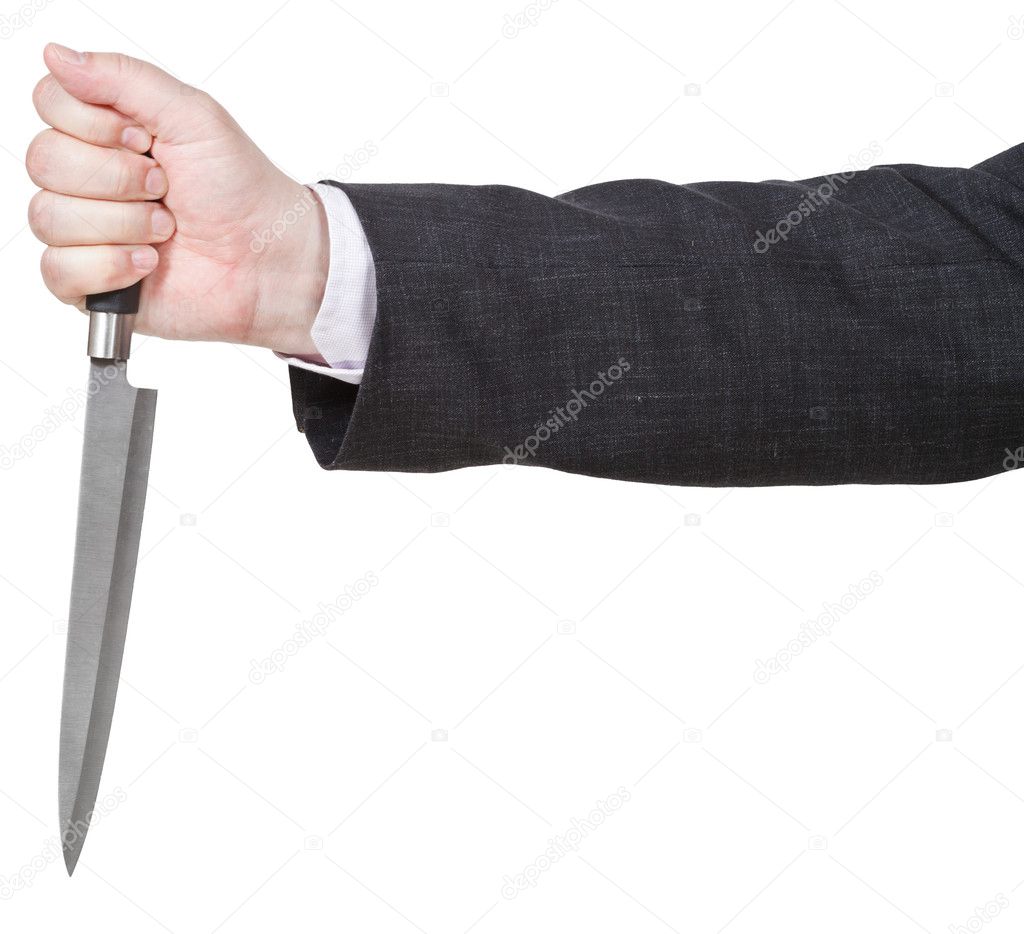 Side view of knife in male hand Stock Photo by ©vvoennyy 50179679