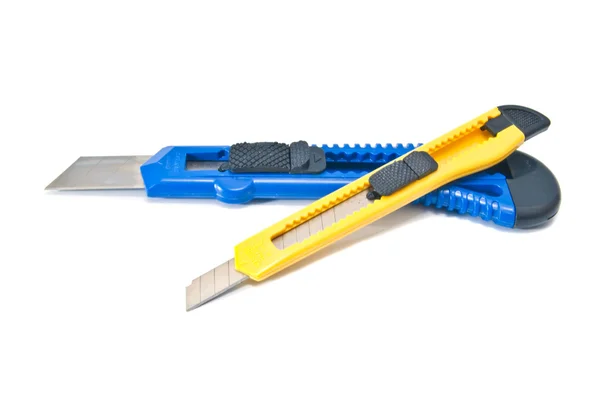 Blue and yellow stationary knife on a white Stock Photo by ©BiggimoT ...