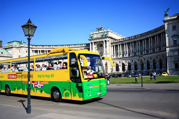 Tour bus with tourists on Heldenplatz square in Vienna , Austria ...
