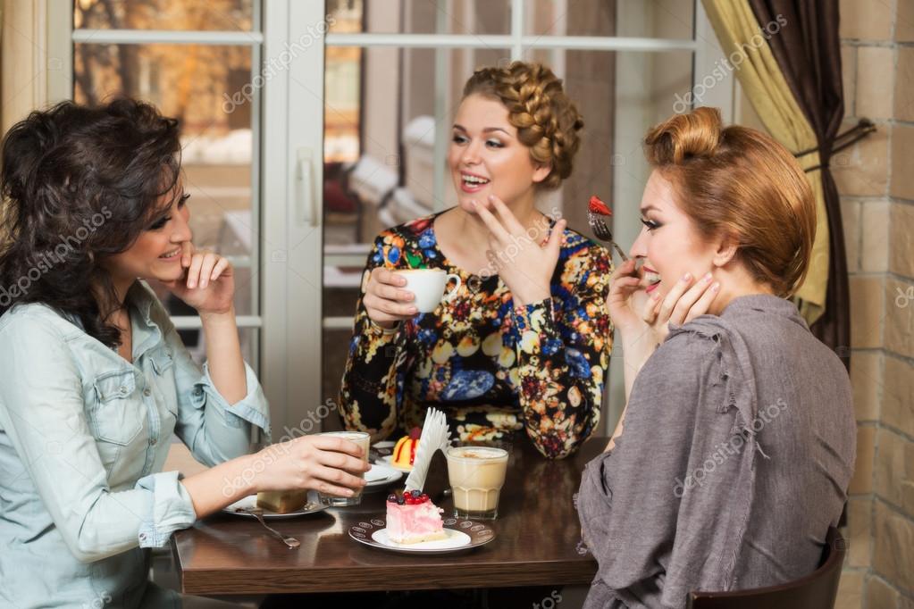 Friends in cafe — Stock Photo © kotin #42793909