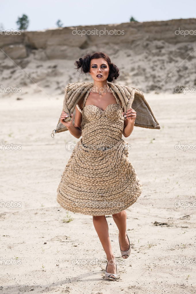 Woman in desert Stock Photo by ©kotin 49935785