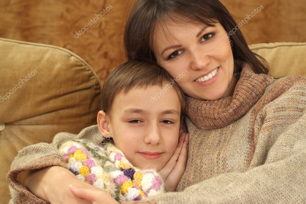 Beautiful charming mom with her son — Stock Photo © aletia #12829859
