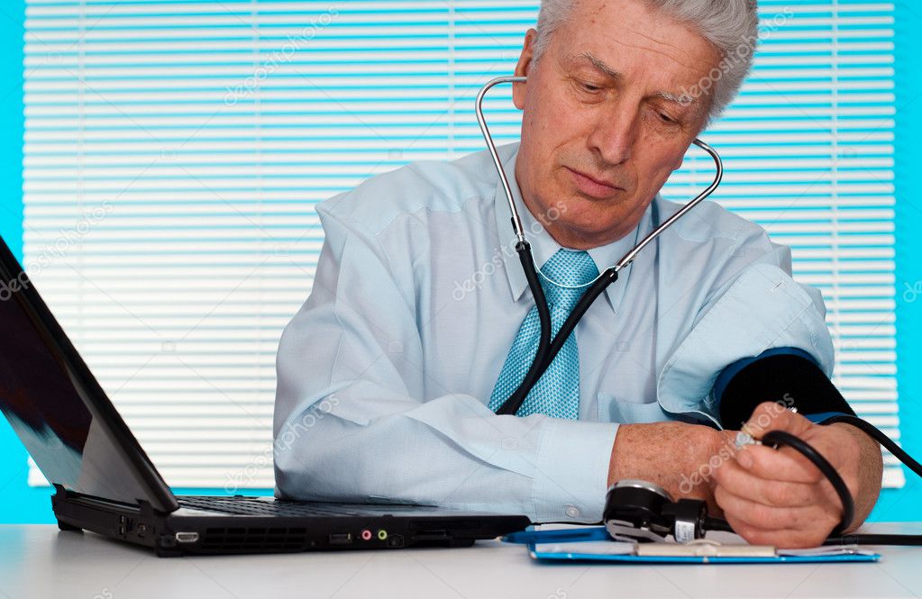 Good doctor in his cabinet — Stock Photo © aletia #12836198