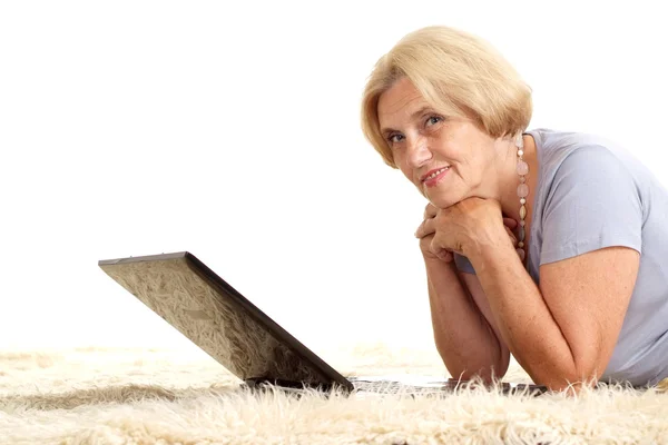 Old woman relaxing at home — Stock Photo © aletia #12841877