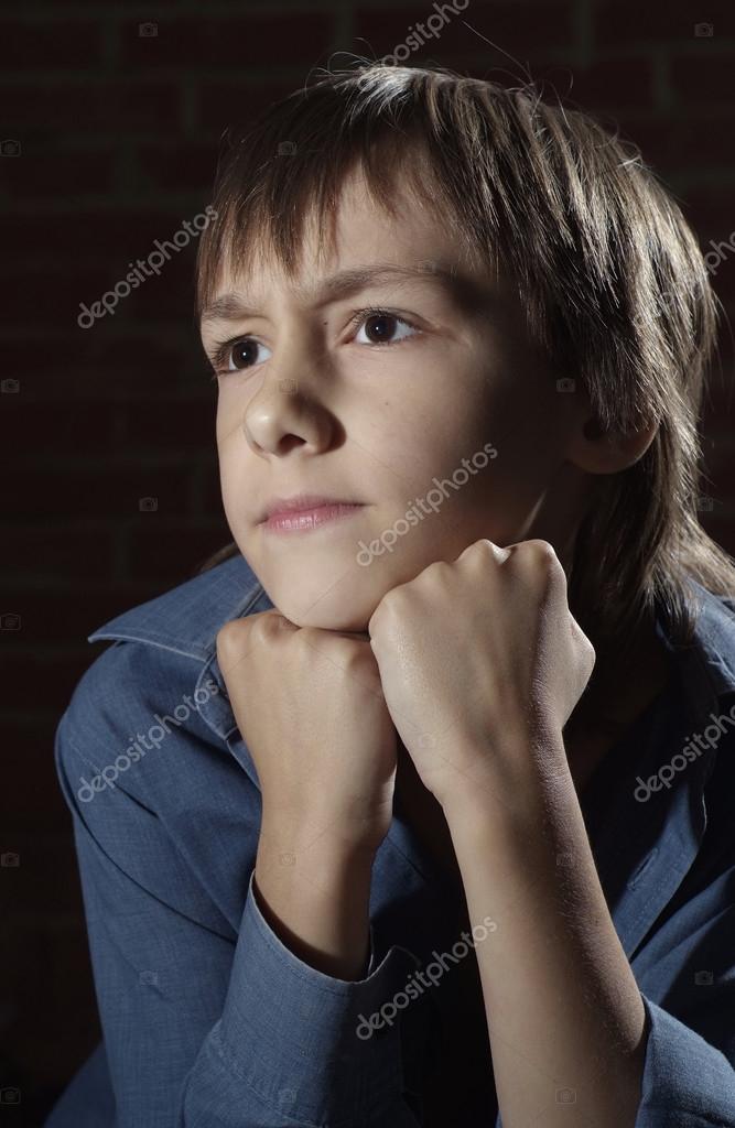 Sad kid in a dark room — Stock Photo © aletia #29824817