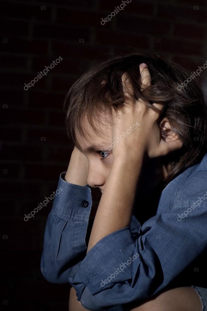 Nice sad boy sitting — Stock Photo © aletia #29825567
