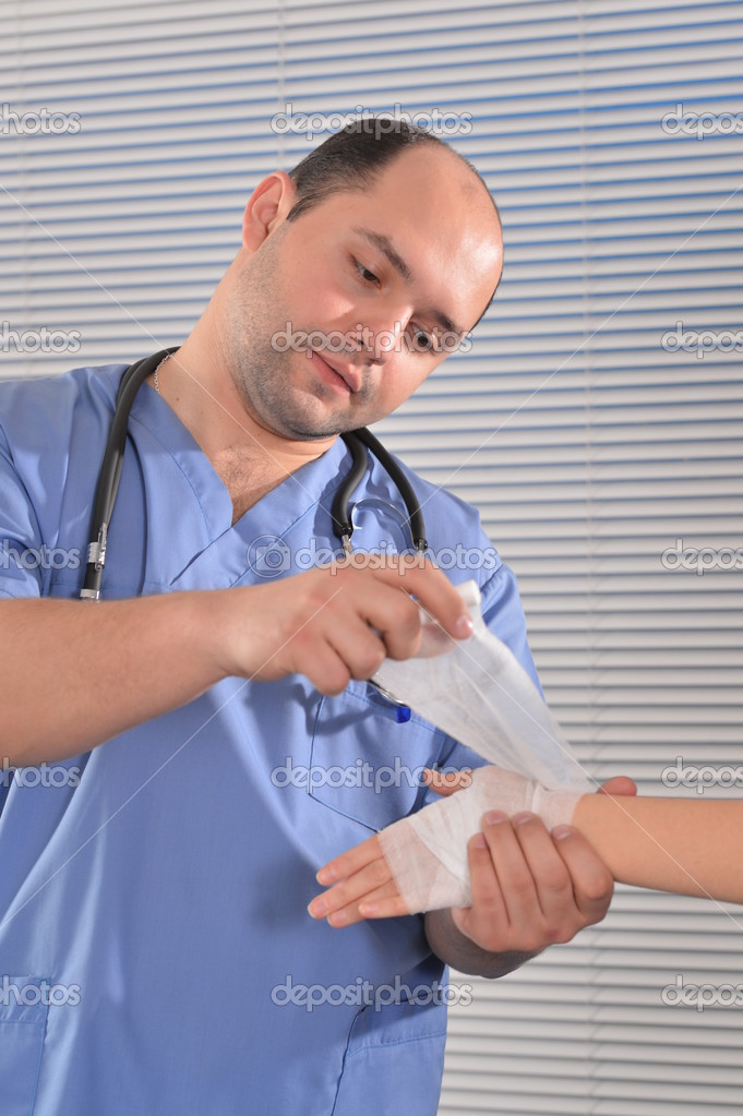Doctor in blue uniform Stock Photo by ©aletia 32398927