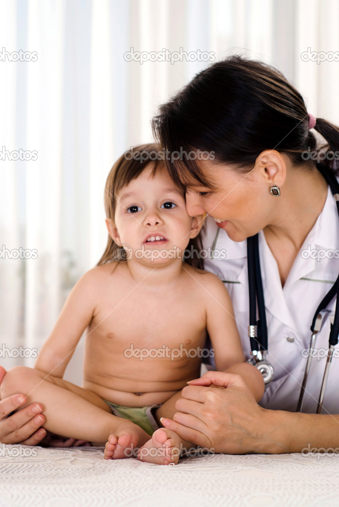 Good-looking doctor with small patient — Stock Photo © aletia #34133053