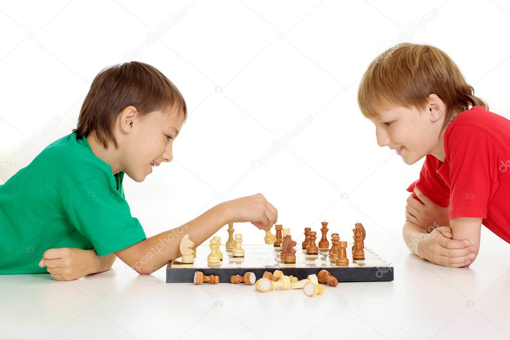 Young boys playing chess Stock Photo by ©aletia 34134325