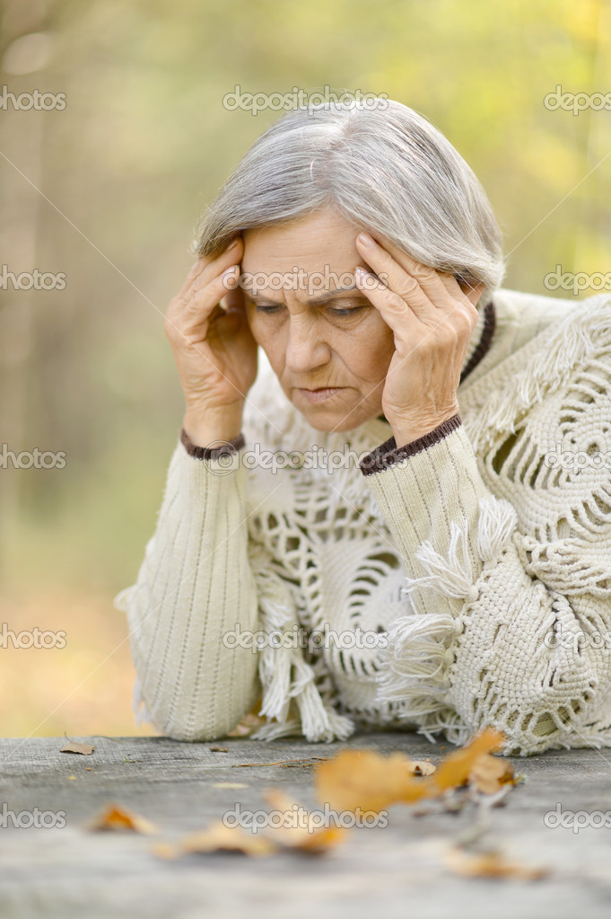 Sad senior woman — Stock Photo © aletia #36628561