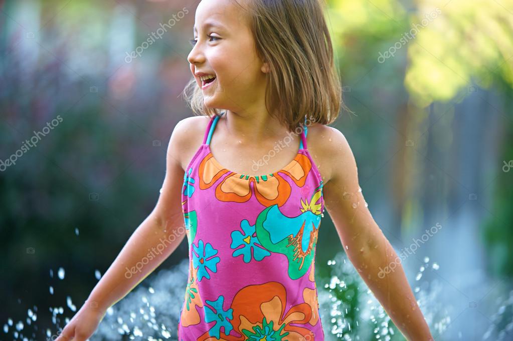 Little Girl Summer Splash Stock Photo by ©bgbs 49611163