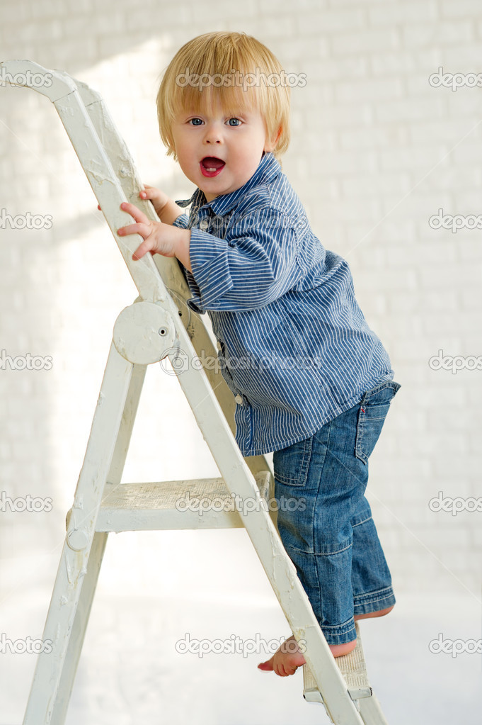 Toddler climbing ladder — Stock Photo © zoiakostina #27625833