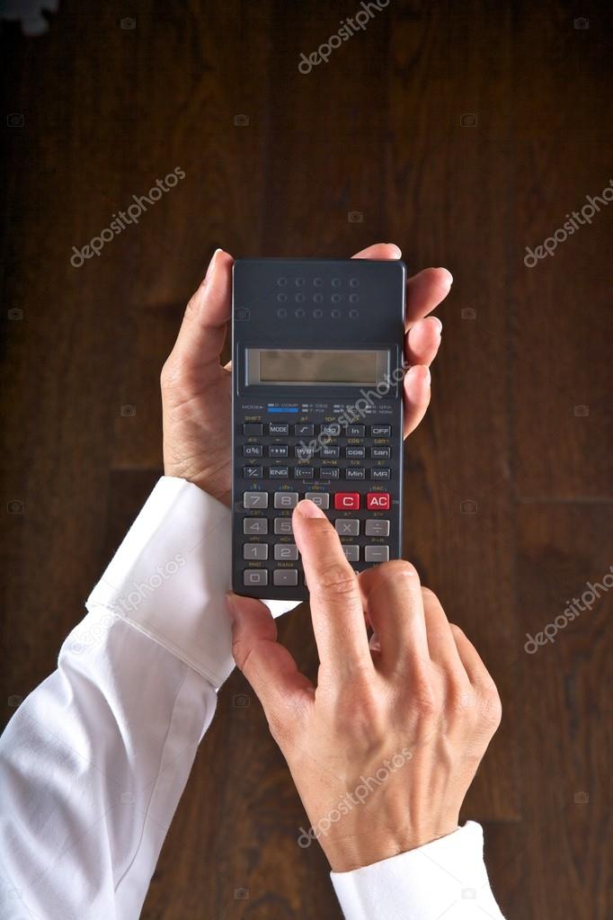Hands with scientific calculator — Stock Photo © quintanilla #12782119