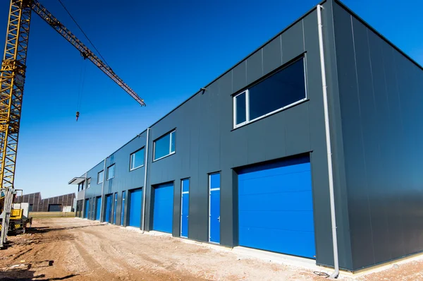 Construction site building new warehouse unit - Stock Image - Everypixel