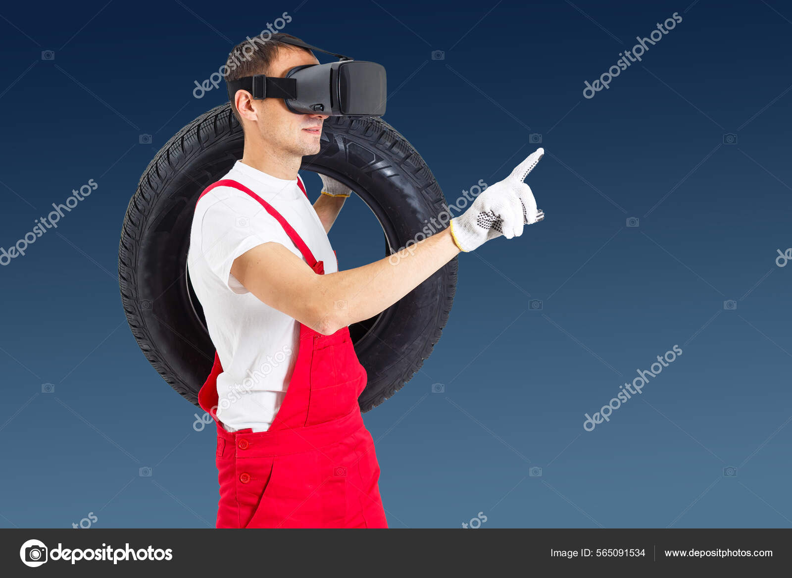 Mechanic with Virtual Glasses Holding Car Tire on a white background ...