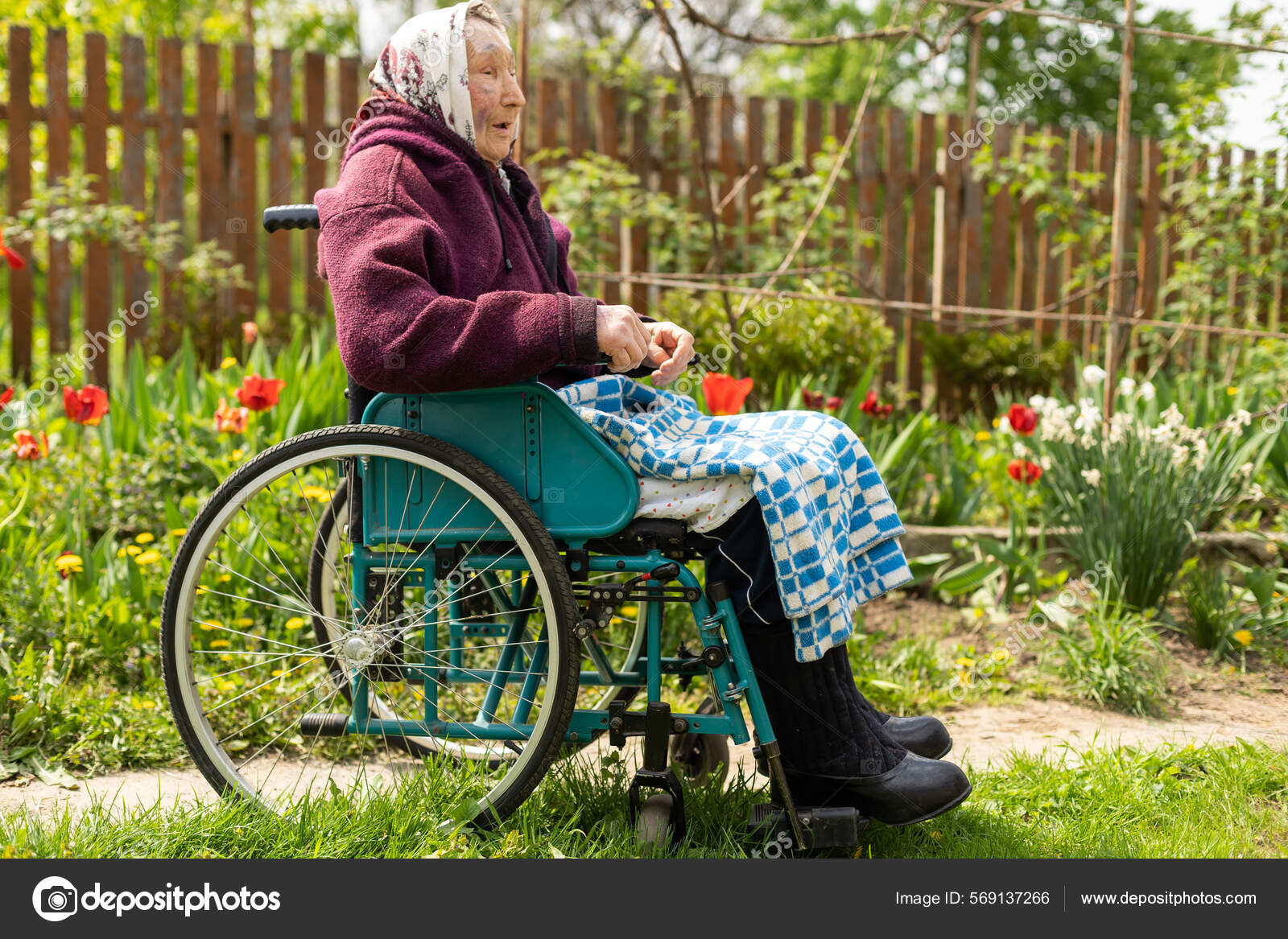 Old woman sitting in a wheelchair looking sad and worried. depression ...