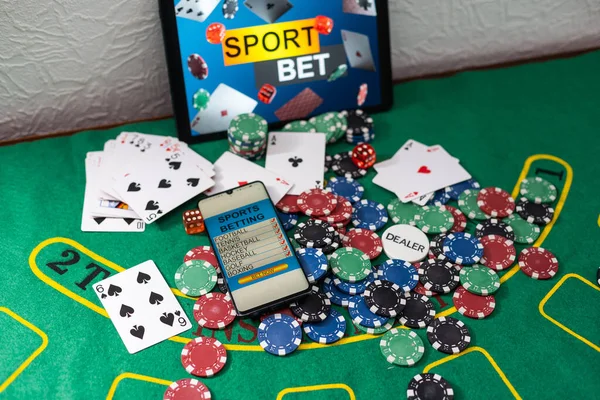 bets online at bookmakers website. smartphone, poker. - Stock Image ...