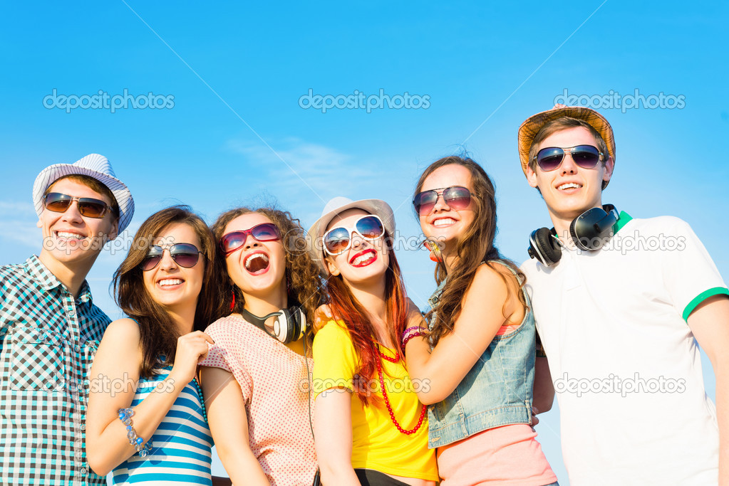 Group of young people wearing sunglasses and hat Stock Photo by ...