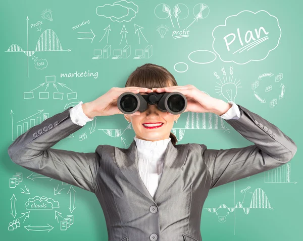 business woman looking through binoculars - Stock Image - Everypixel