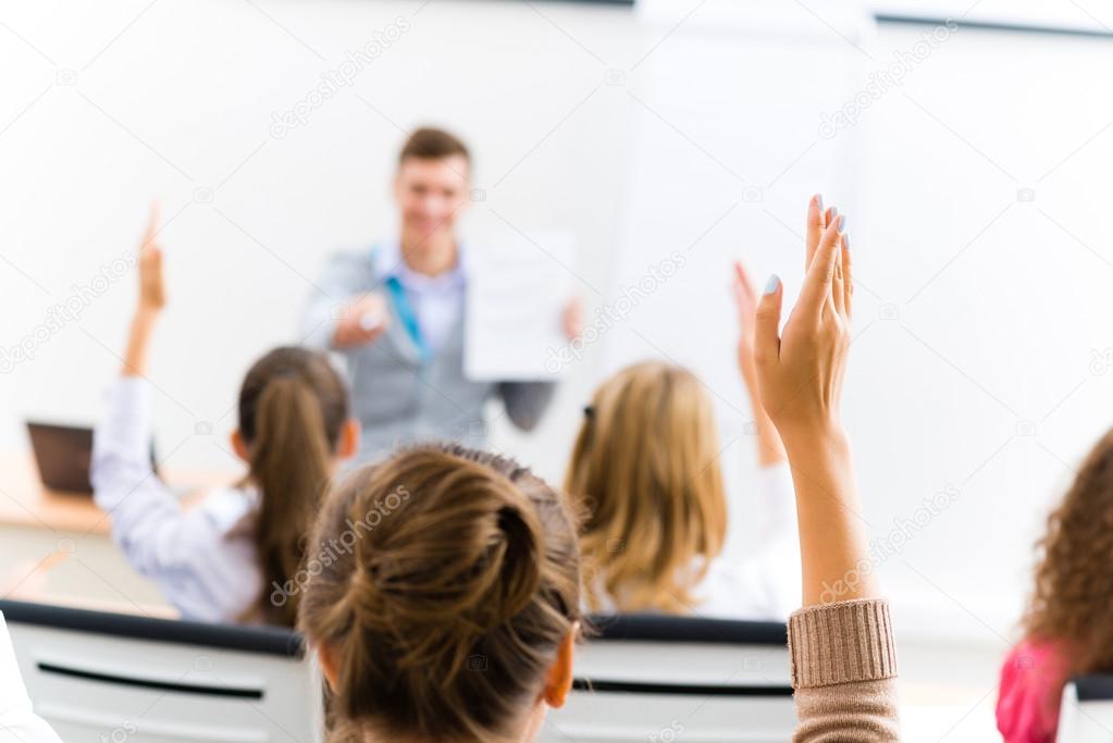 Female hand raised in class — Stock Photo © Khakimullin #43202197