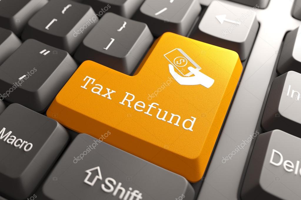 Keyboard with Tax Refund Button. Stock Photo by ©tashatuvango 27007315