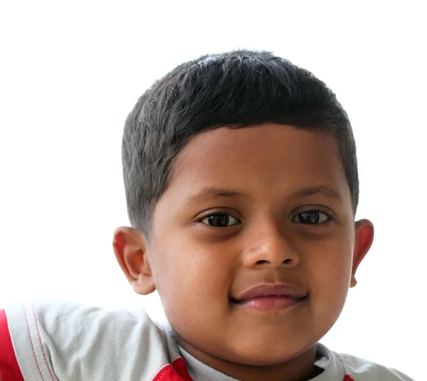 Cute and handsome happy indian boy with naughty smile Stock Photo by ...