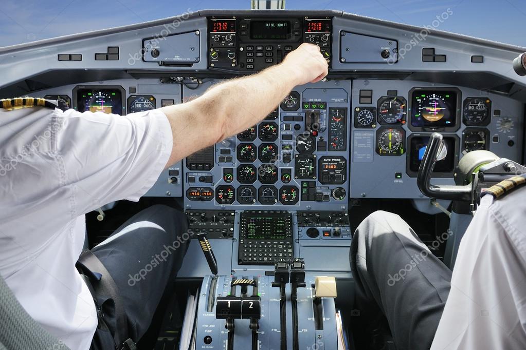 Pilots in the plane cockpit — Stock Photo © canaryluc #49835161