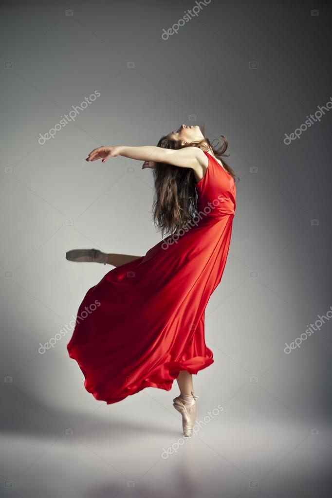 Ballet dancer wearing red dress over grey — Stock Photo © Julenochek ...